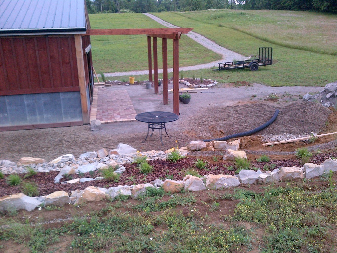 The Barn Pergola Patio Begins - Old World Garden Farms
